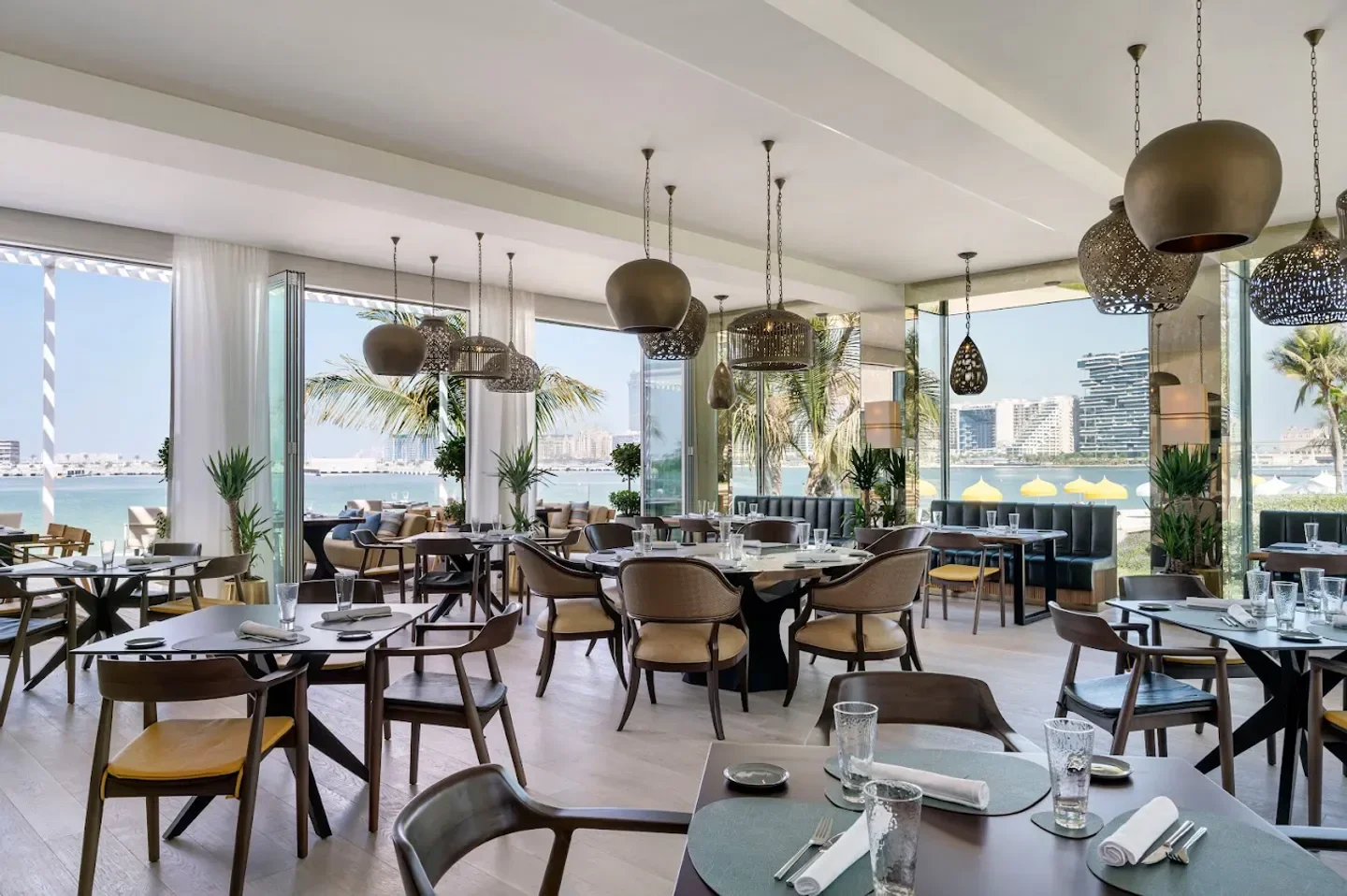 Interior dining at The Beach Bar & Grill in Dubai with views of the ocean
